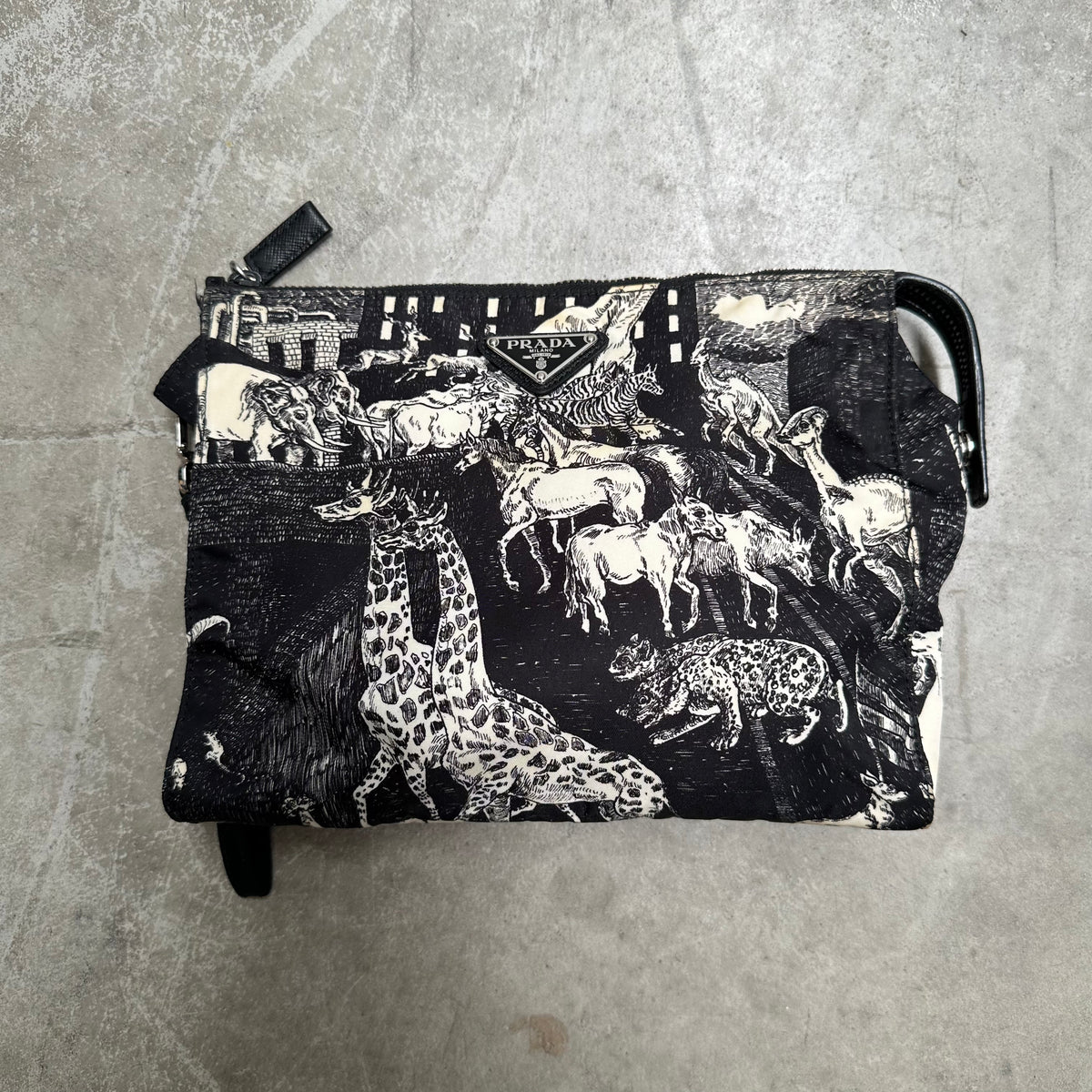 Prada Animal Kindom Clutch with Strap – Curated by Charbel