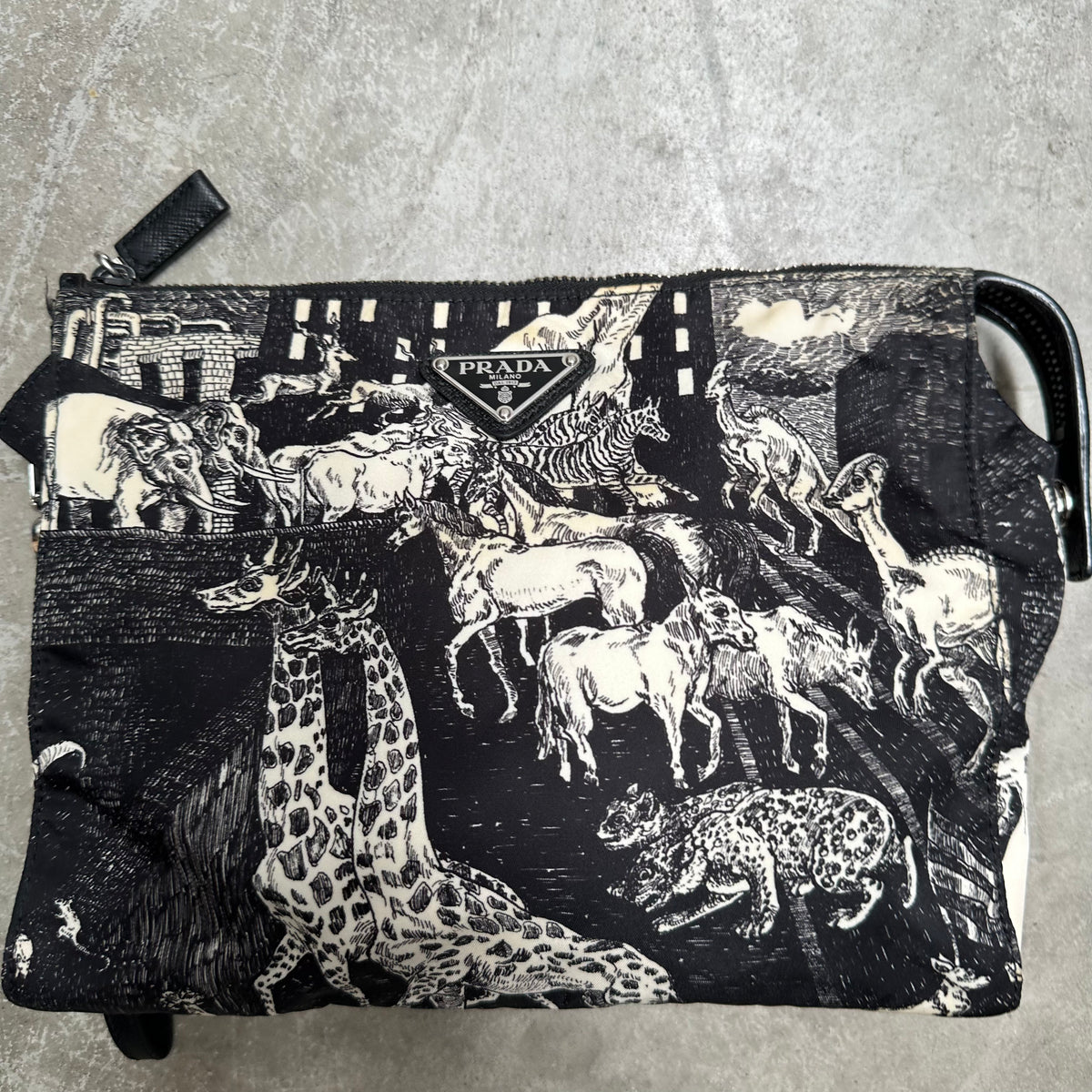 Prada Animal Kindom Clutch with Strap – Curated by Charbel